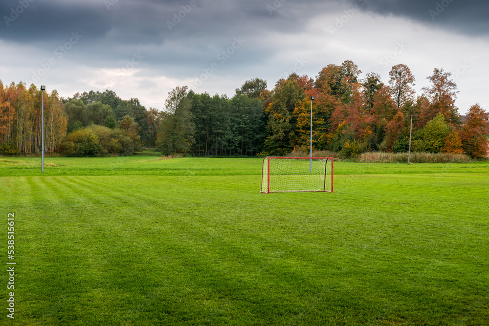 A football (soccer) training ground in a rural autumn landscape ...