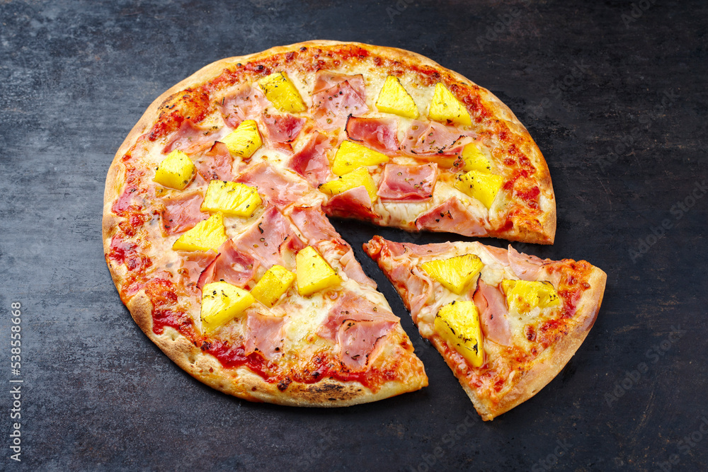 Traditional Italian pizza Hawaii with ham, pineapple and mozzarella ...
