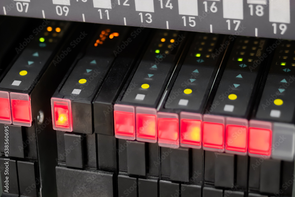 Lighting status indicator signals on electric control panel of ...