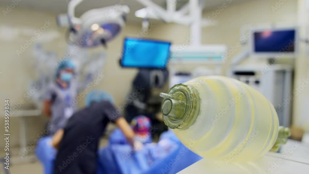 Jackson Pratt Drain bulb lying on the equipment at foreground. Close up ...