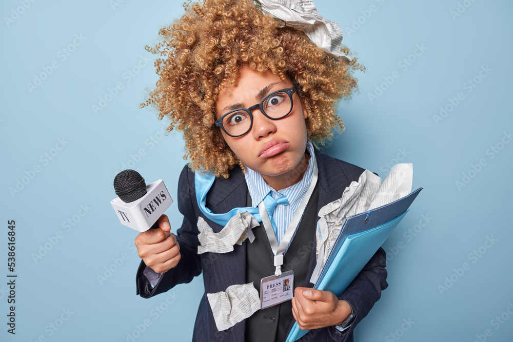 Journalism and breaking news concept. Serious displeased curly haired ...