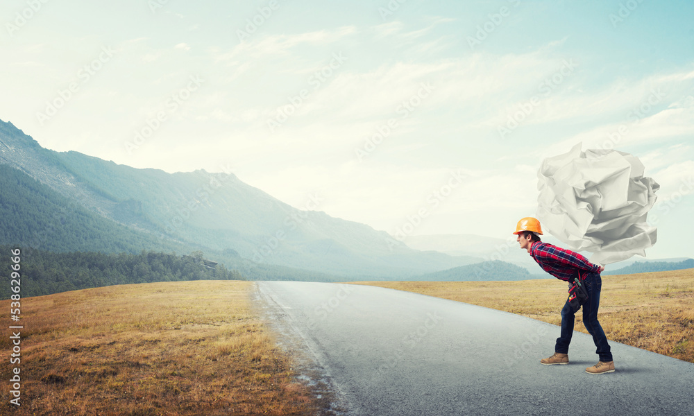Engineer man carry load Stock Photo | Adobe Stock