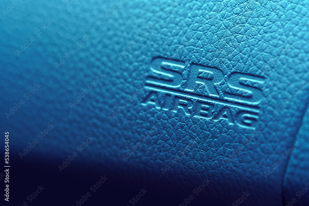 Car airbag sign. SRS airbag marking on the plastic panel of the car ...
