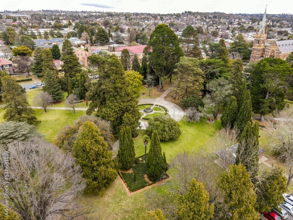 Aerial view of the town of Armidale with buildings, a cathedral, War ...