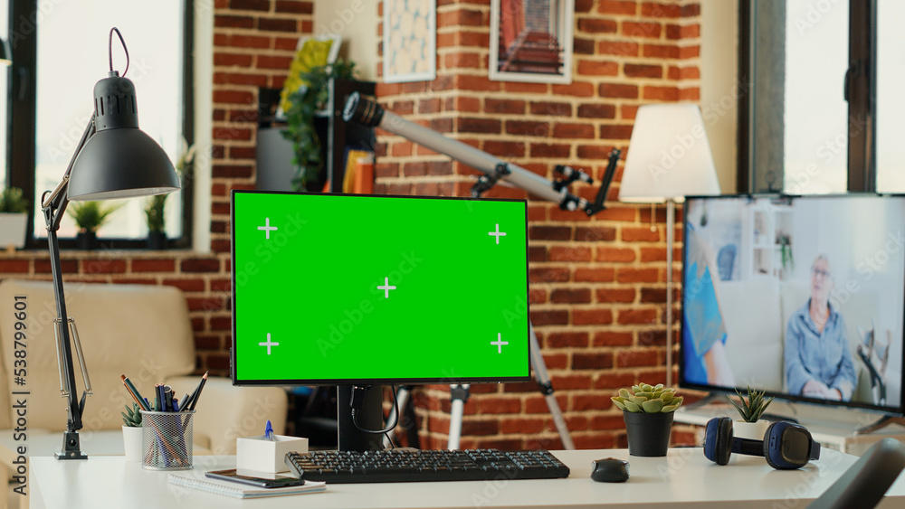 Empty office desk with greenscreen template on monitor, isolated mockup ...