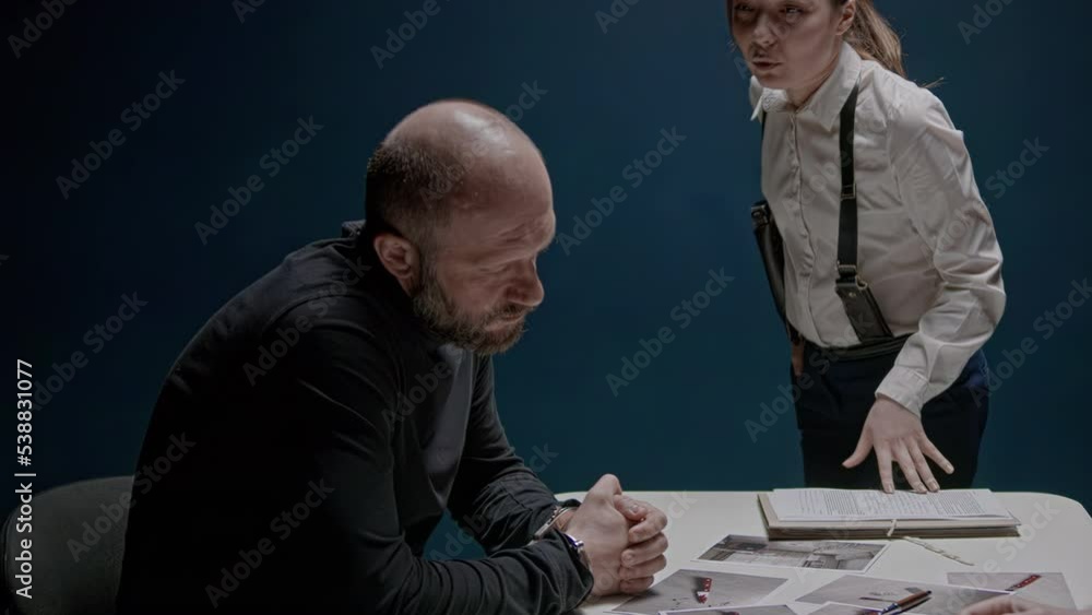 Police detective shows suspected criminal knife in blood in Evidence ...