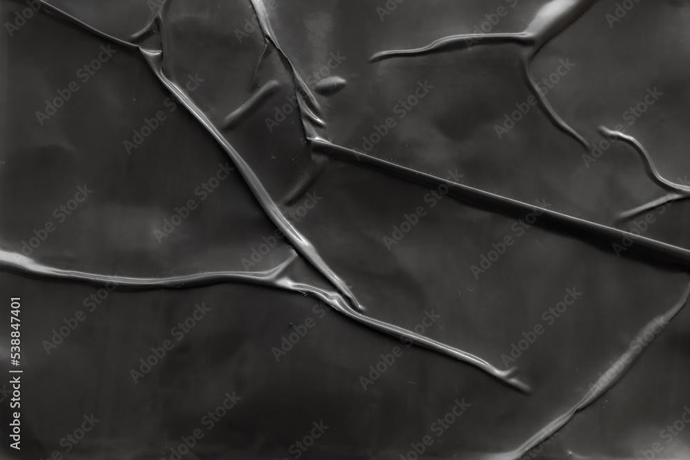 black crumpled and creased plastic poster texture background Stock ...
