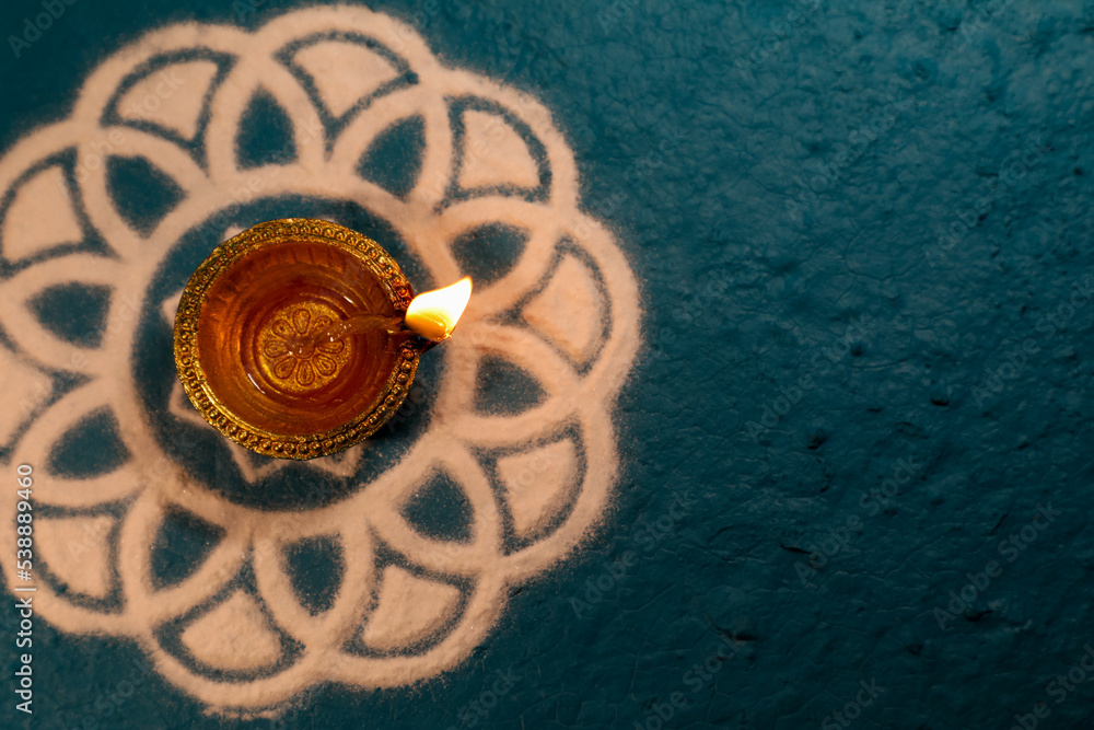 Happy Diwali Festival of Lights teal color background with golden ...