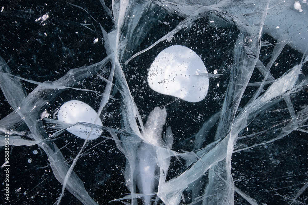 Texture of clean transparent ice on Baikal with a beautiful pattern and ...