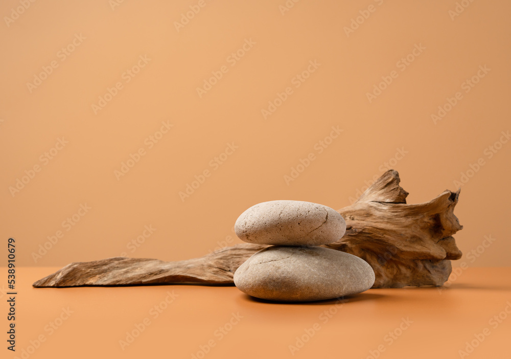 Mockup stage for advertising made with stones and weathered snag on a ...