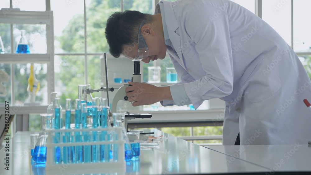 Research concept of 4k resolution. Asian scientists are examining the ...