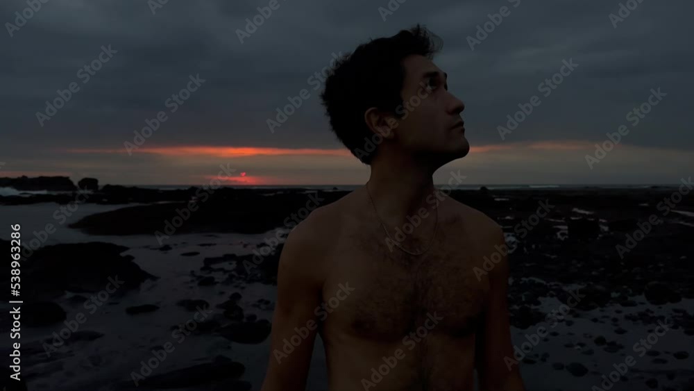 Darkness conquering light. Sudden dark after sunset on ocean beach ...