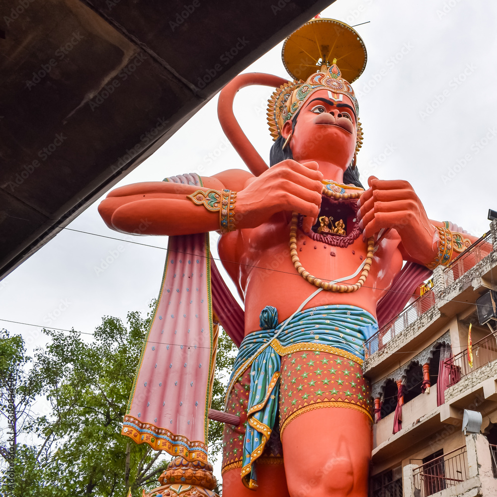 Big statue of Lord Hanuman near the delhi metro bridge situated near ...