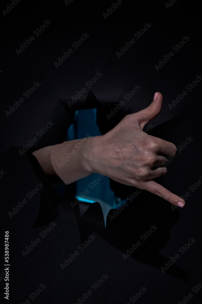 Female hand showing the gesture with extended up the little finger and ...