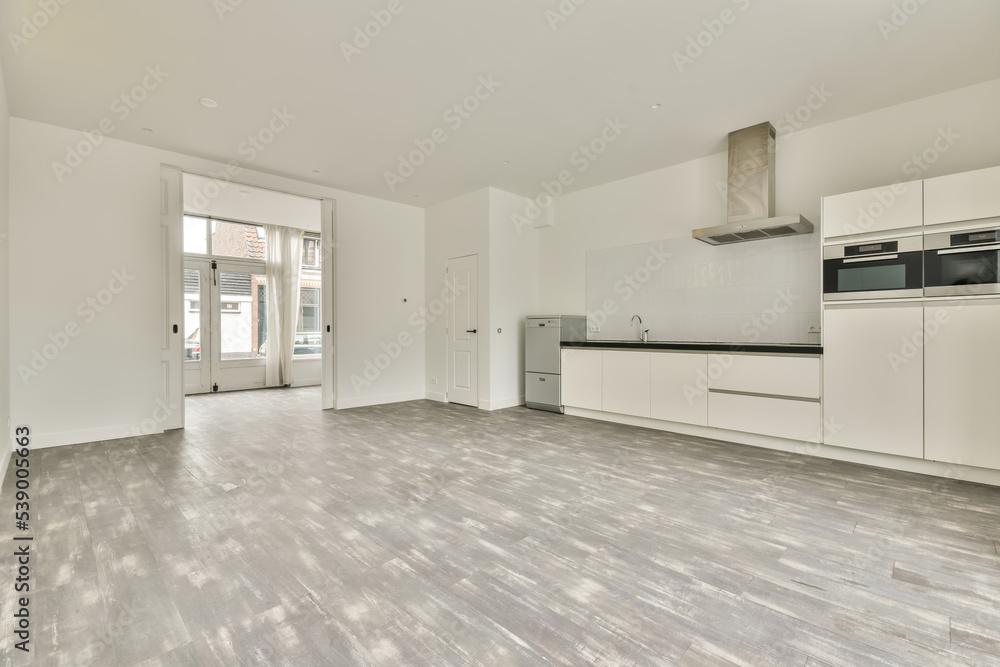Empty kitchen room of a modern flat Stock Photo | Adobe Stock