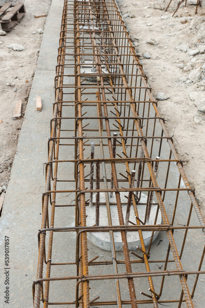 Monolithic foundation with metal reinforcement construction mesh ...