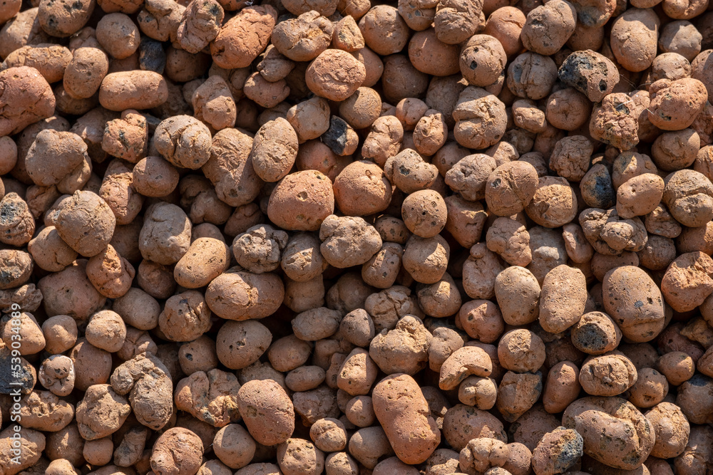 Expanded clay aggregate texture background in sunlight. Stock Photo ...