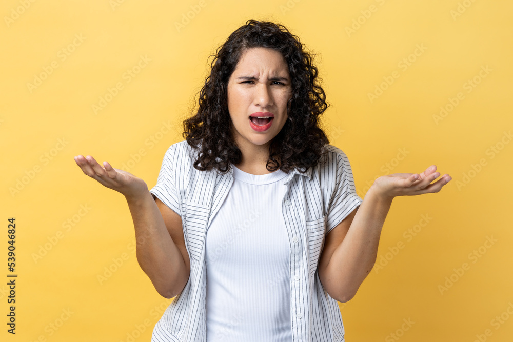 Portrait of unhappy stressed beautiful woman with dark wavy hair ...
