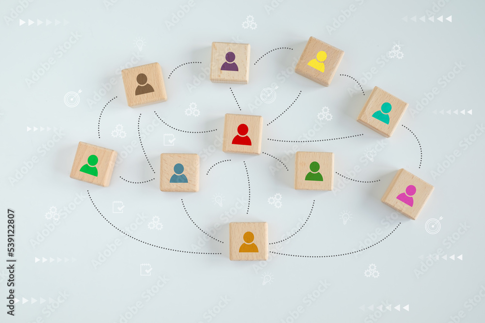 Many human icon on wooden blocks with line connection symbol for spread ...
