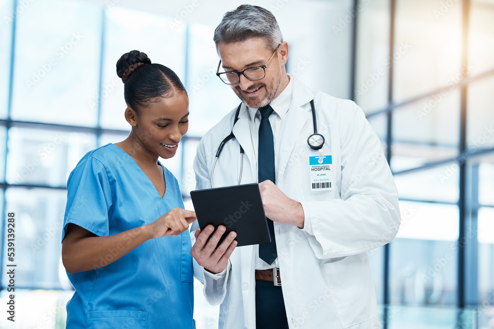 Teamwork, tablet and healthcare with a doctor and nurse working ...