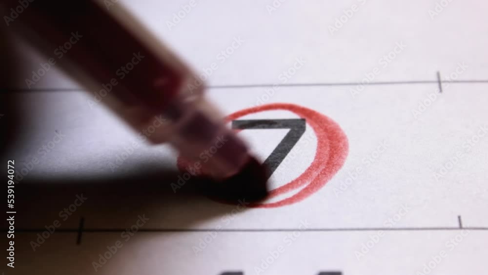 Number seven on the calendar is highlighted in red, a reminder of an ...