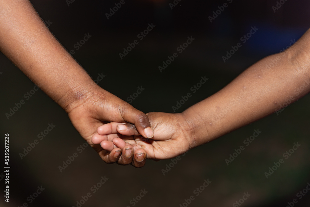 Aboriginal children holding hands Stock Photo | Adobe Stock