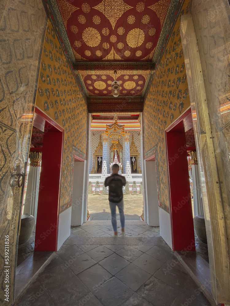 Wat Arun Temple in Bangkok, Thailand with stone pyramid towers, golden ...