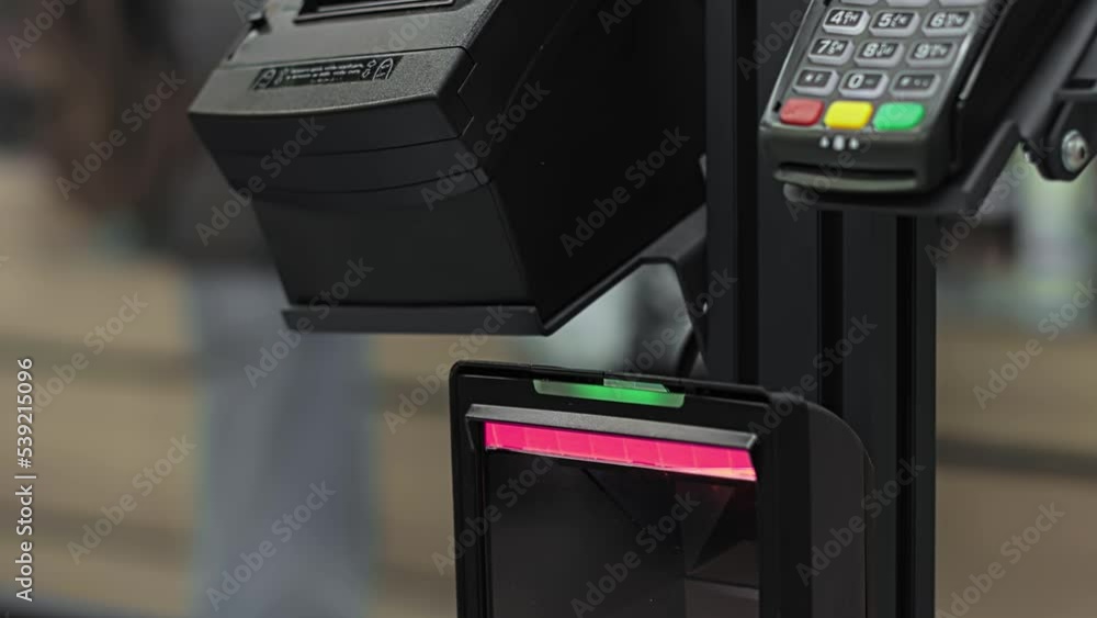 Blinking flashing scanner for reading barcodes at self-service checkout ... Blinking flashing scanner for reading barcodes at self-service checkout ...