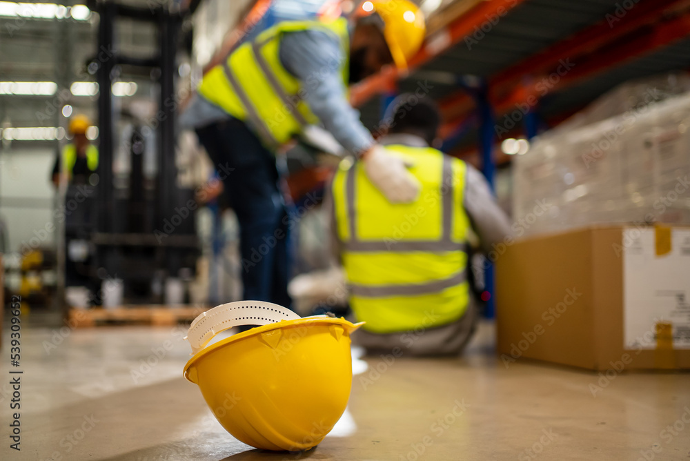 Factory Accident, Industrial accident. Warehouse staff having accident ...