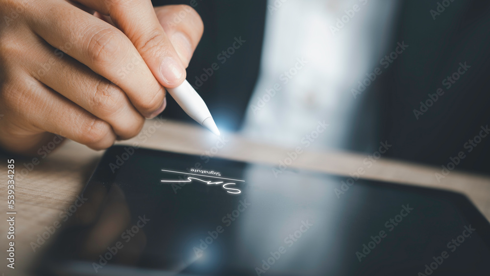 Paperless workplace and Digital Signature or e-signature concept ...