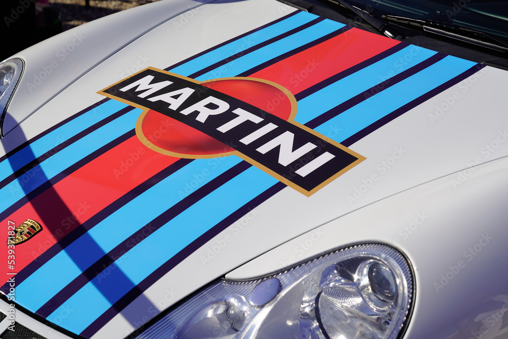 Porsche 911 and martini logo brand and text sign on classic sport ...