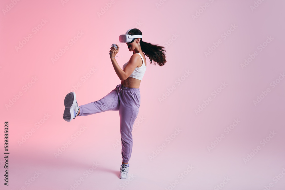 Virtual reality fun. Woman dancing while wearing a vr headset Stock ...