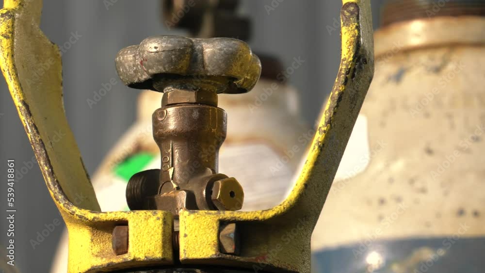 Cylinder valve. Gas bottling plant. 4K, UHD, 50p, Panning,Close-up ...