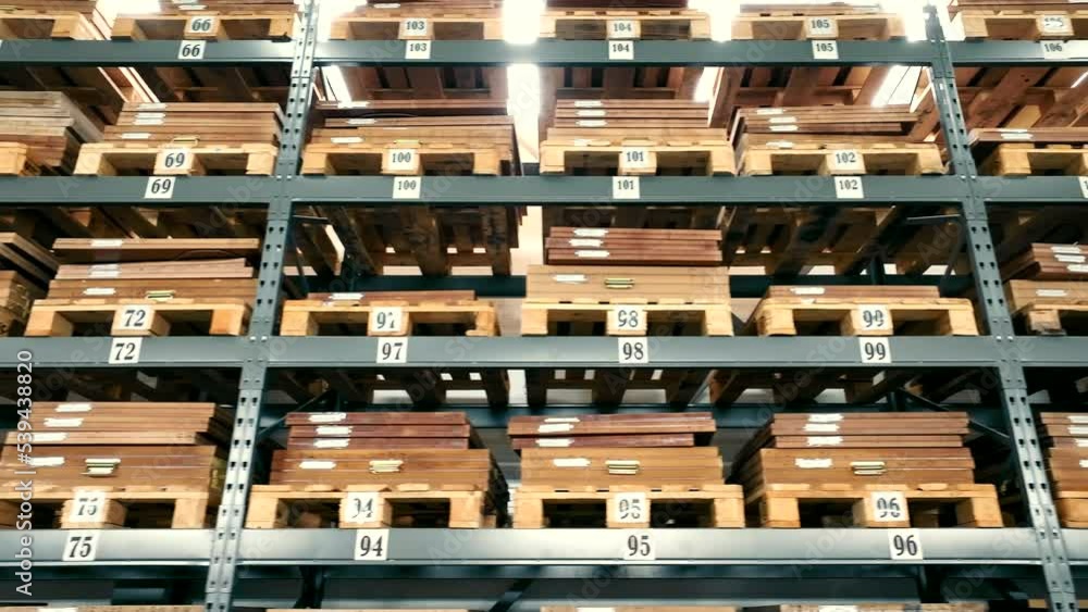 storage of goods on wooden shelves of a large warehouse. Storage of ...
