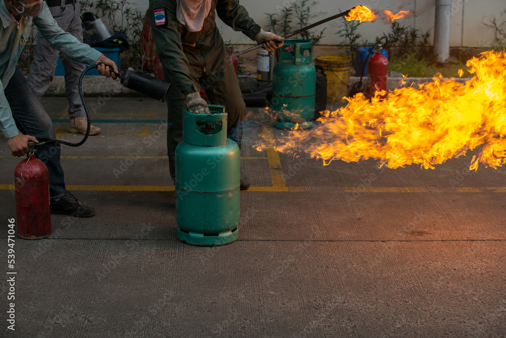 The trainee used a carbon dioxide fire extinguisher to extinguish a ...