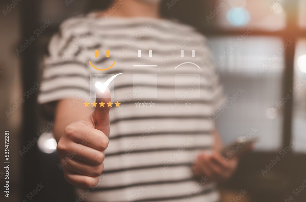 Satisfied female customer presses smile face emoticon on virtual touch ...