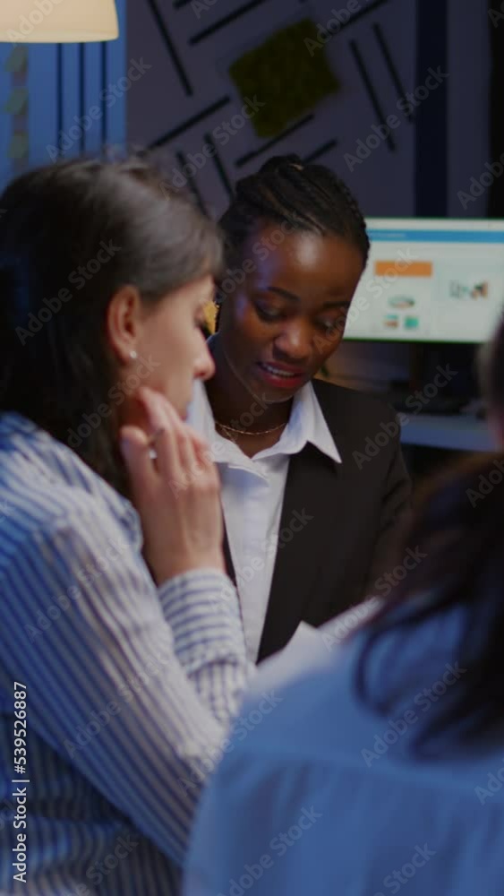 Vertical video: Black african american manager brainstorming company ...