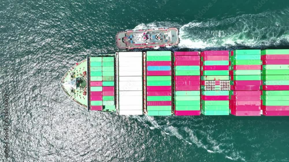 Container cargo ship was dragged by tug boat to international cargo ...