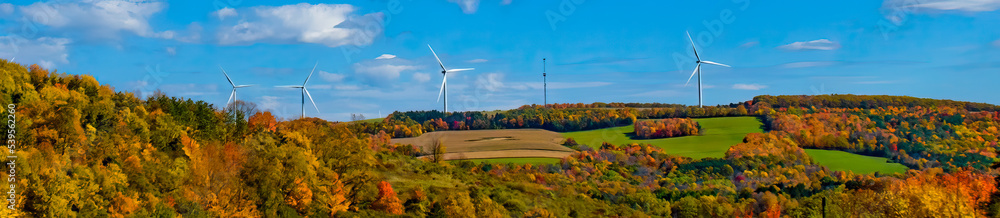 Windmill Turbines line the mountaintop ridge in central NY state ...