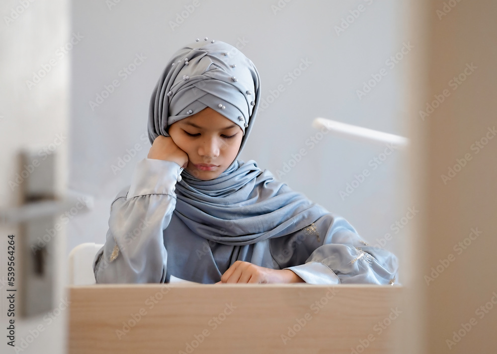 Preteen Muslim kid study in classroom.Portrait of Muslim student in ...