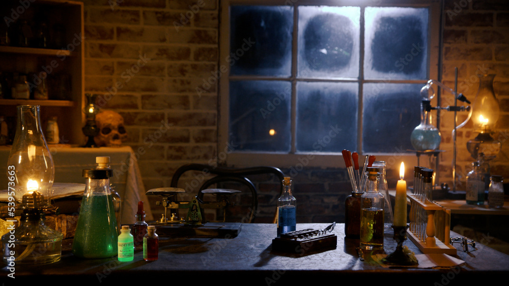 scary halloween laboratory background with glowing and bubbling potions ...