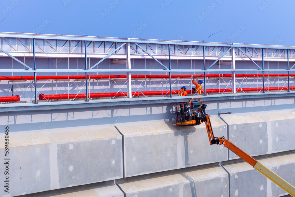 MEP Construction Workers are working insatallation Fire Protection ...