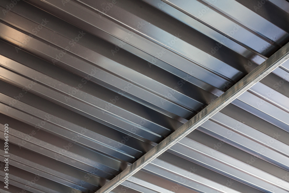 Iron structure, roof covered with corrugated aluminum sheets on metal ...