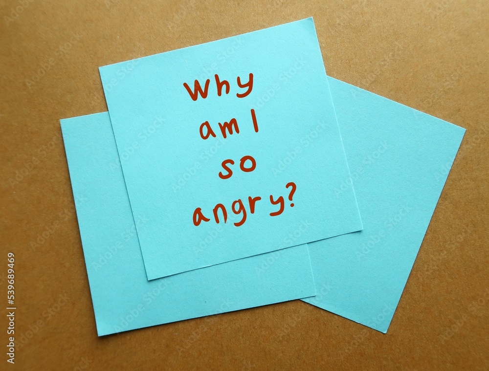 Blue note on office envelope with handwritten text WHY AM I SO ANGRY ...