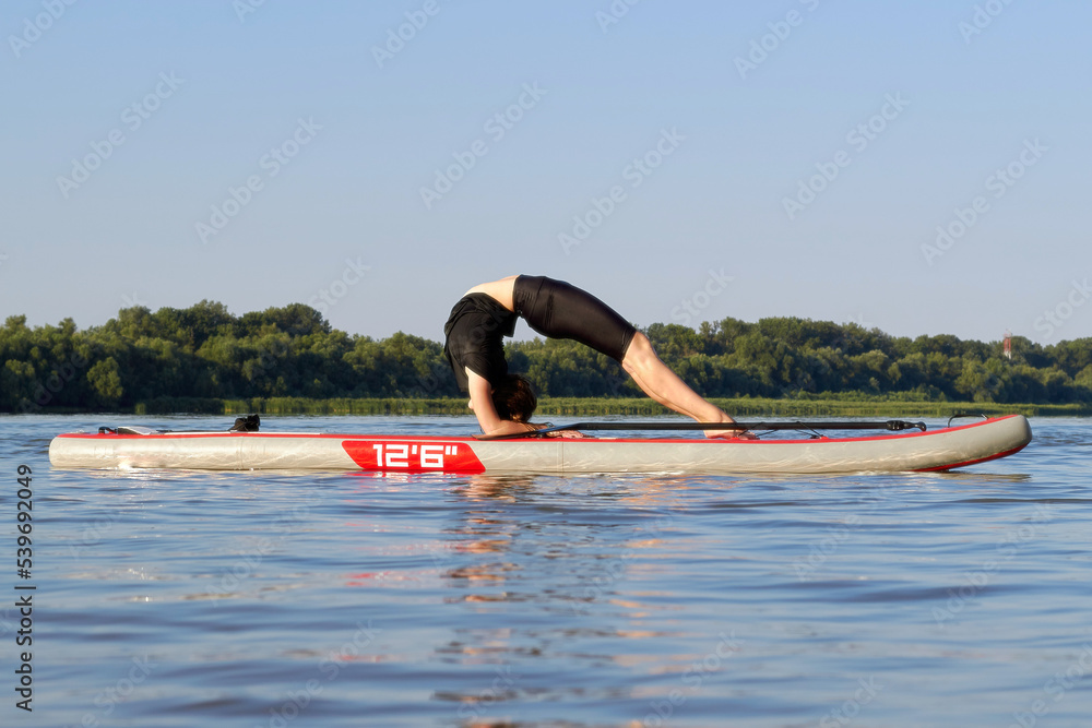 Slim woman with long white hair makes gymnastics exercise for stretch ...