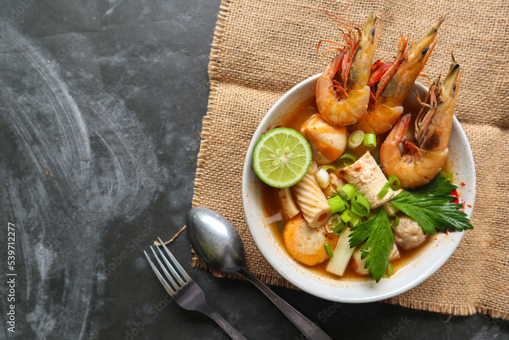 Tom yam soup originating from Thailand. Tom yum is made with shrimp ...