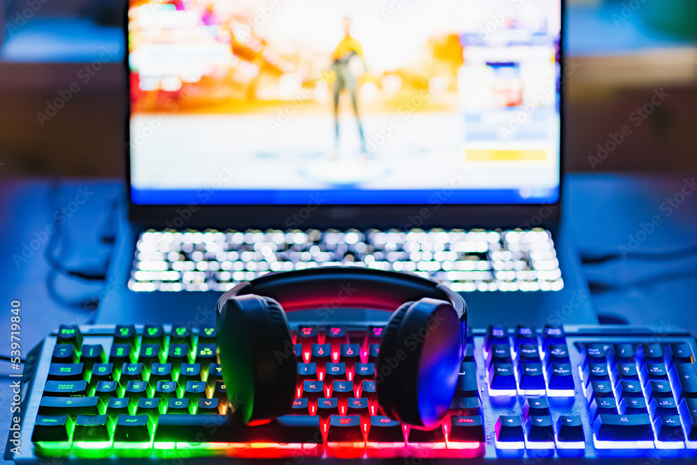 Gamer workspace concept.Gaming gear, keyboard, joystick, Headset ...
