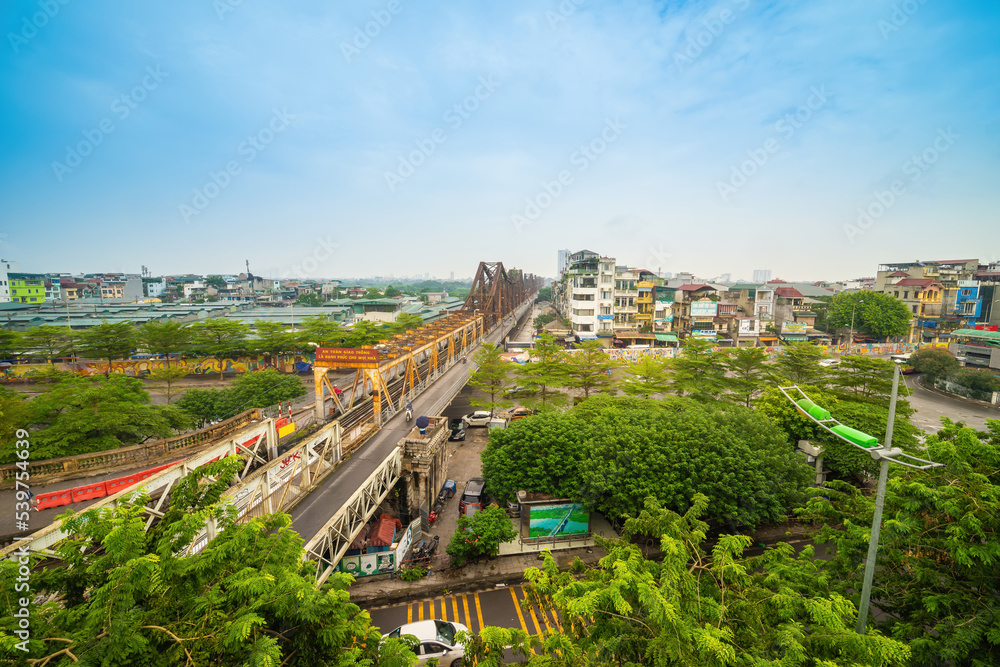 View of Long Bien bridge over Hong (Red) river. Though the bridge was ...