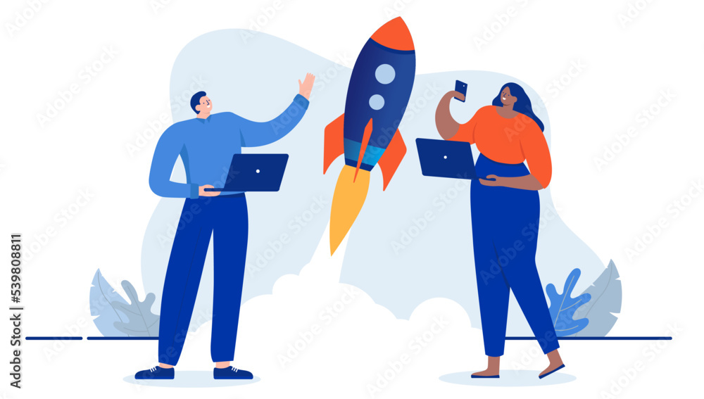 Business rocket launch - Man and woman at work with laptop computer ...