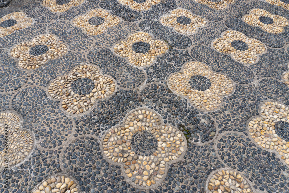 Chinese pebble decorative walkway of artistic designs. Reflexology ...